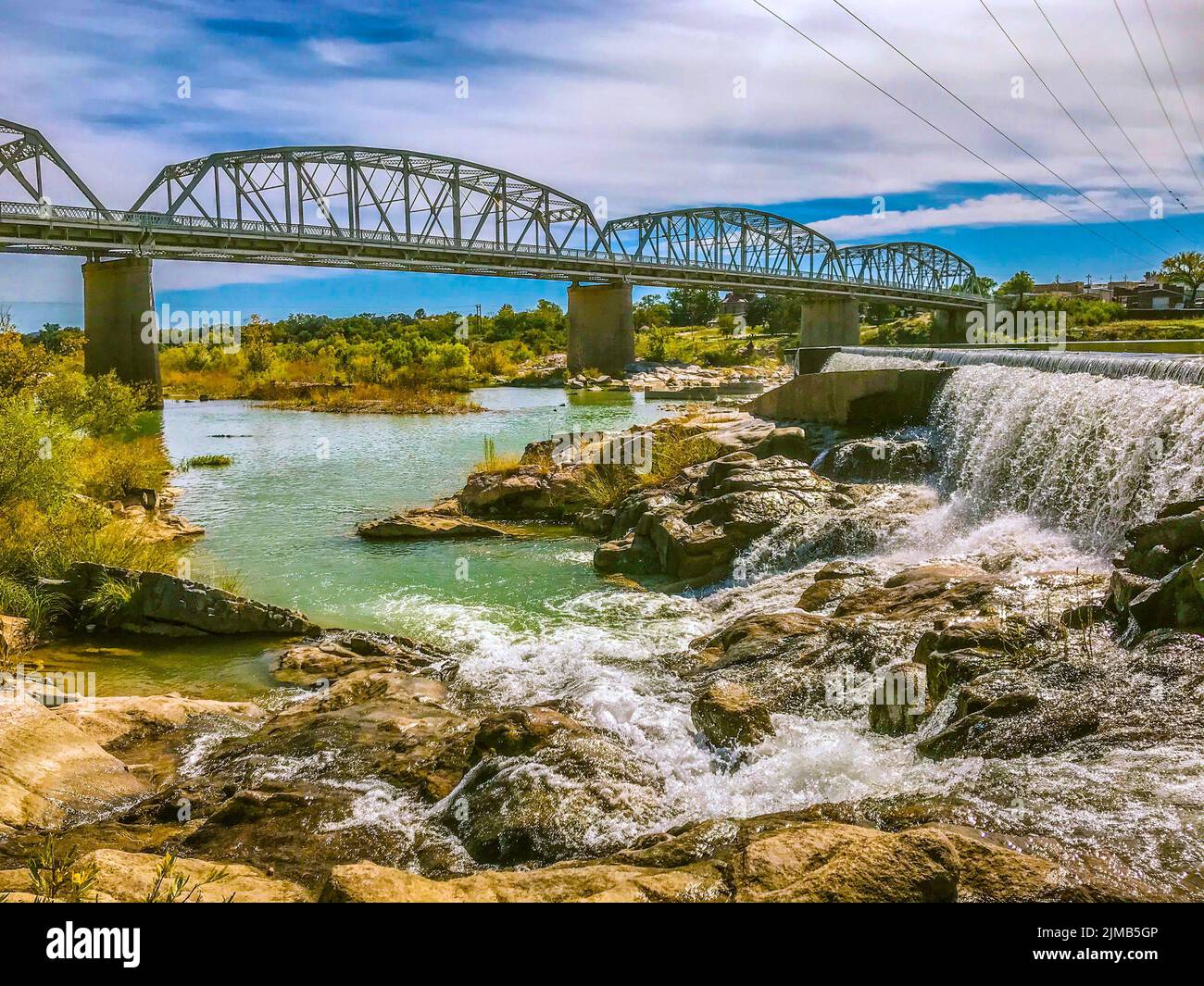 A wonderful bridge on the Llano River and magnificent falls Stock Photo ...