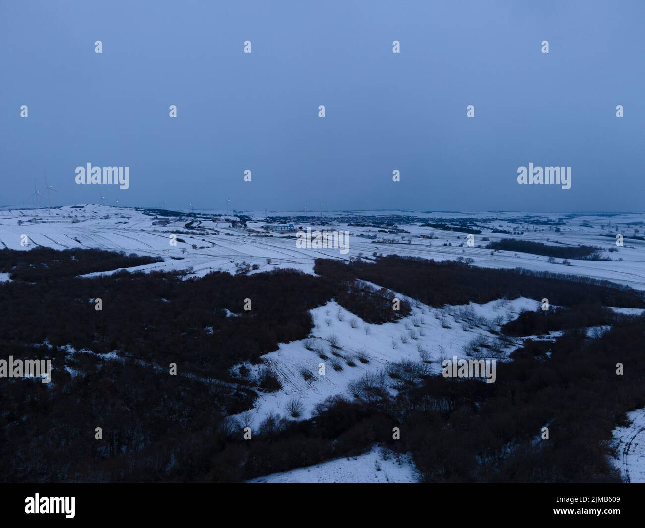 A landscape of pale snowy roads and hills Stock Photo - Alamy