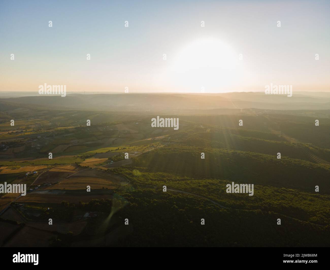 Sunrise over green fields wallpaper hi-res stock photography and images ...