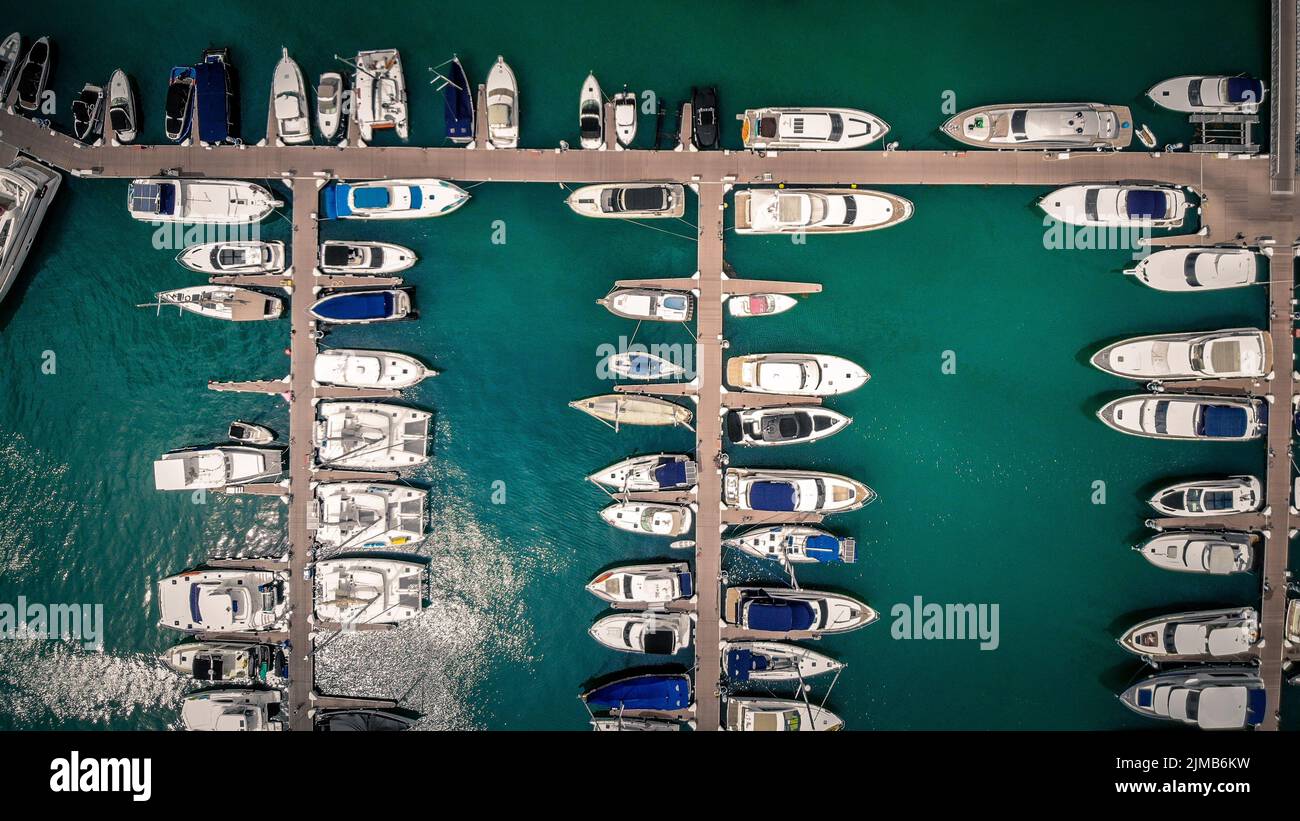 A top view of a busy harbor with many parked boats and yachts Stock ...