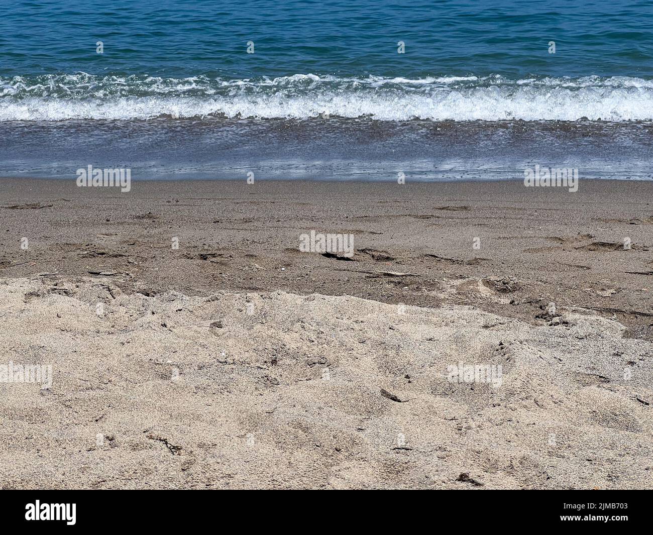 An empty clean beach in Morocco Stock Photo - Alamy