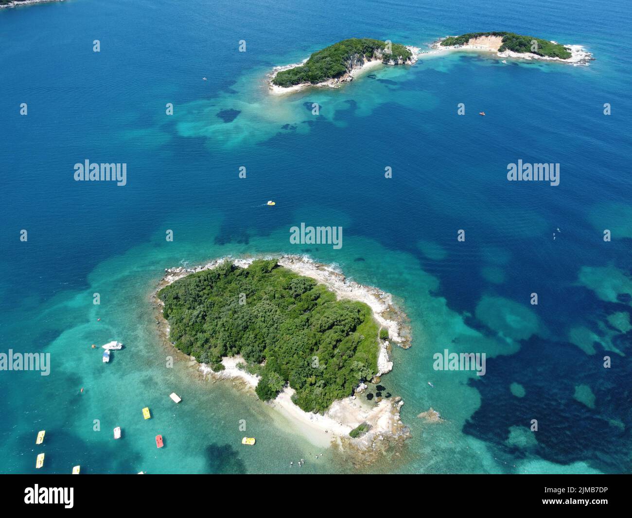 A beautiful drone view of tropical Ksamil islands and Mediterranean sea ...