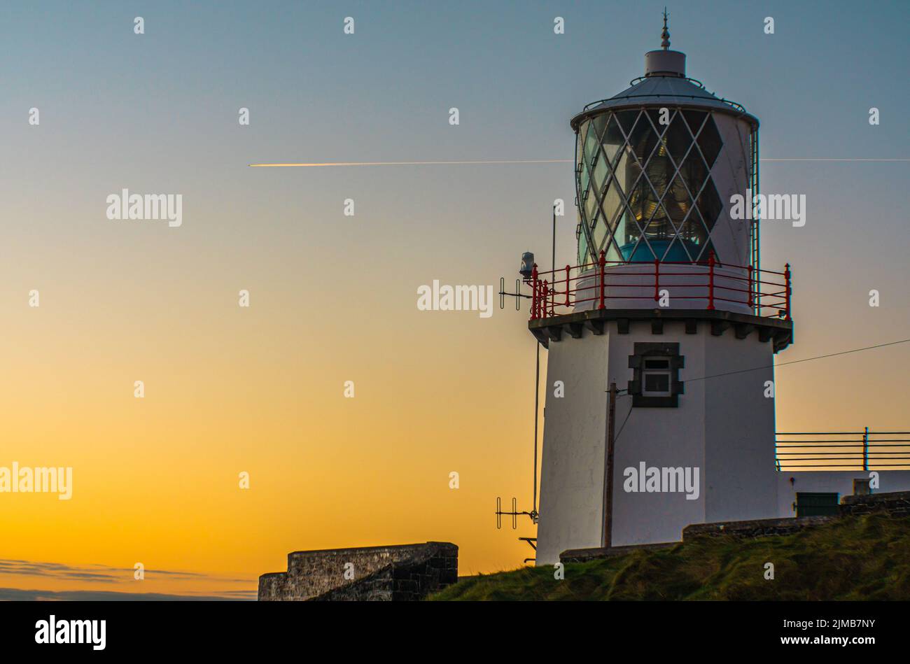 The Irish lighthouse with the light spinning Stock Photo - Alamy