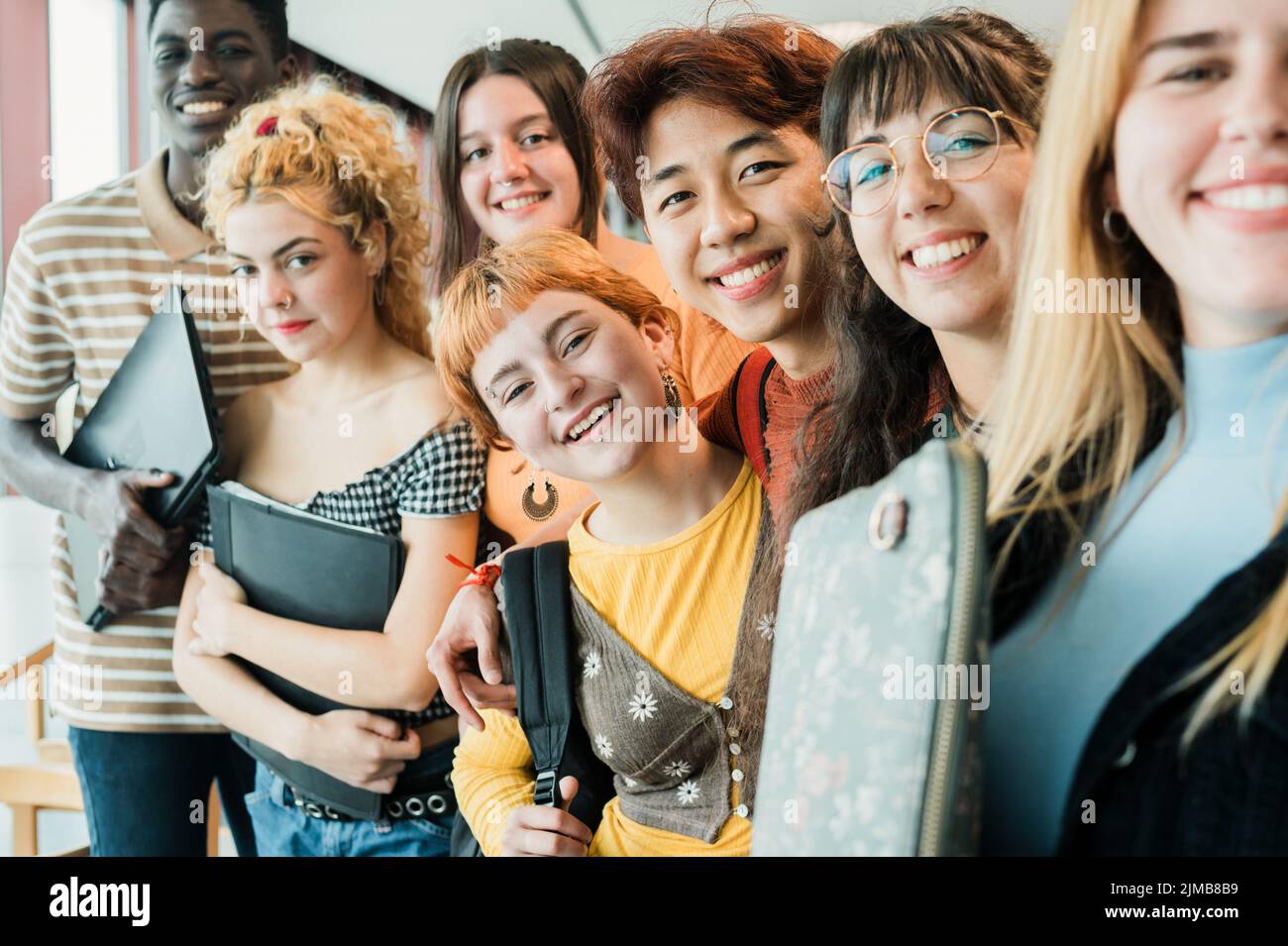 Diverse teen students taking selfie together Stock Photo - Alamy