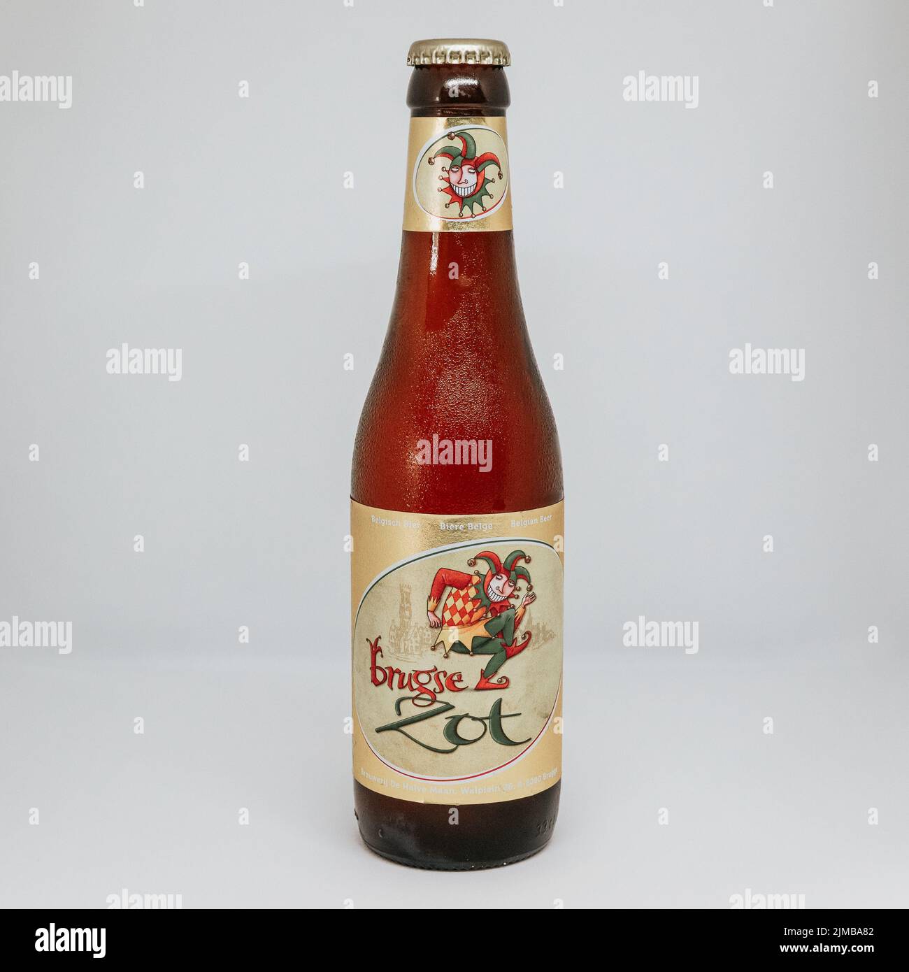 A bottle of Brugse Zot beer isolated on white background Stock Photo ...