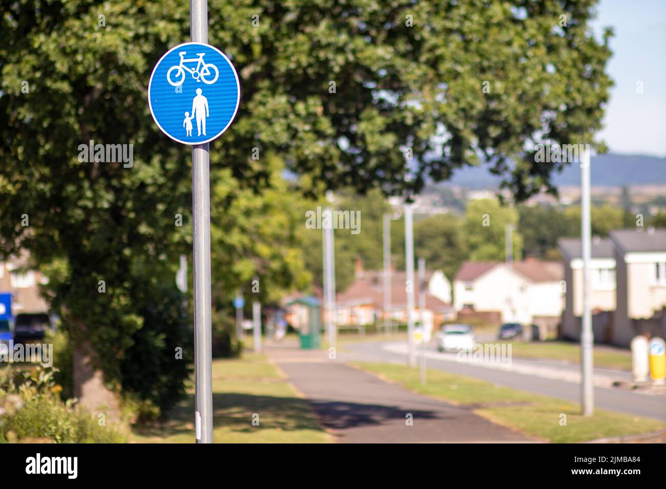 A closeup of a pedestrian and a bike path sign on the streets Stock ...