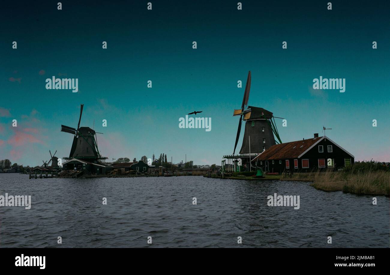 A beautiful calming scene of windmills Stock Photo - Alamy