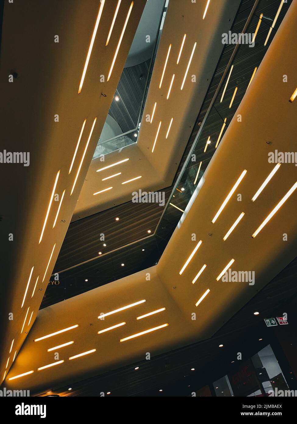 A vertical low angle of a mall interior design Stock Photo - Alamy