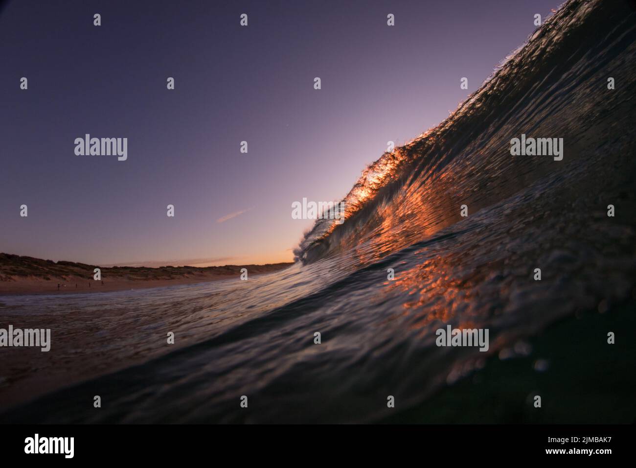 Ocean wave in evening sunset hi-res stock photography and images - Alamy