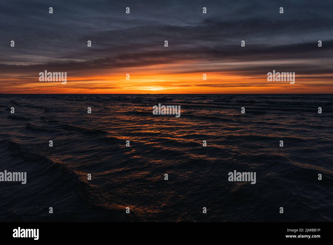 A beautiful landscape of the sea on the sunset Stock Photo - Alamy