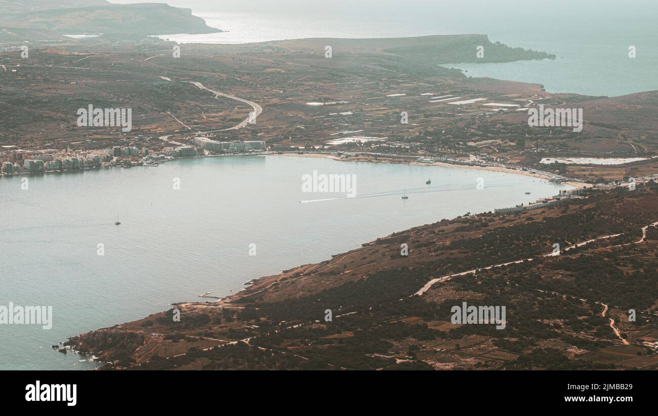 An aerial view of the city by the sea, Ghadira Bay, Malta Stock Photo ...