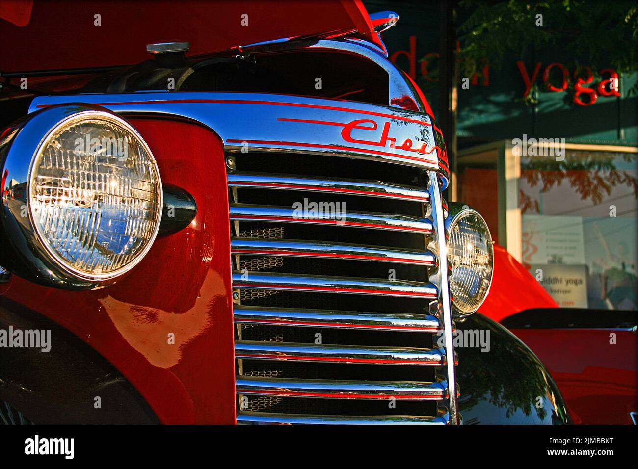 A red retro Chevrolet pickup truck at a car show Stock Photo - Alamy