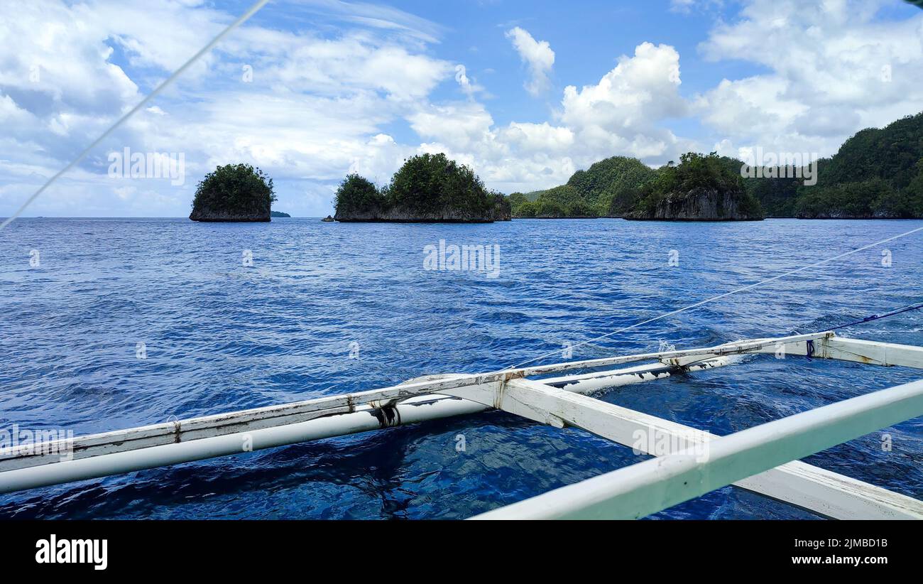 A beautiful view of a calm blue sea and an island from a boat Stock ...
