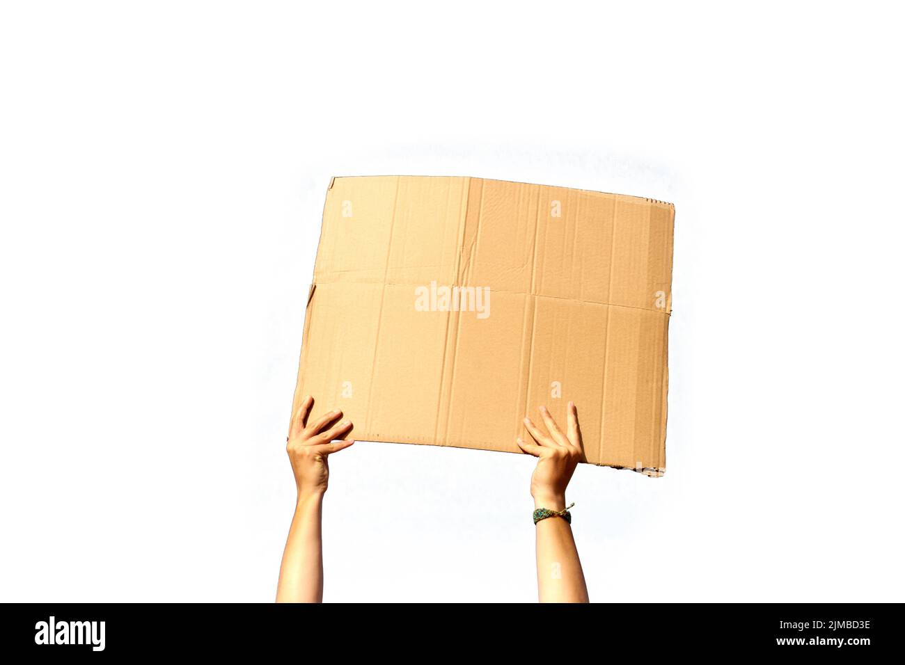 A cardboard Signs empty held by hands on a white background ready for ...
