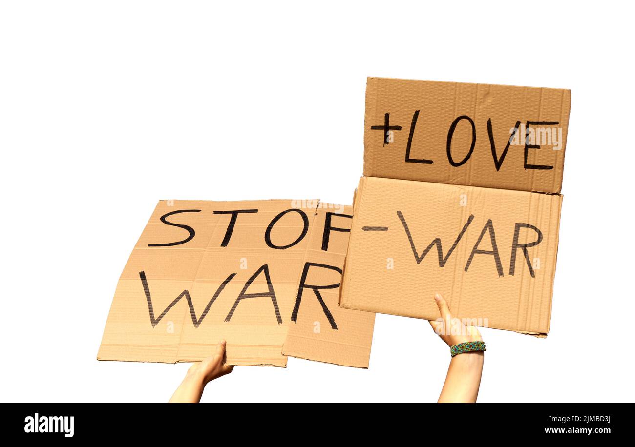 Two Cardboard Signs saying more love, less war and Stop War held by ... Two Cardboard Signs saying more love, less war and Stop War held by ...