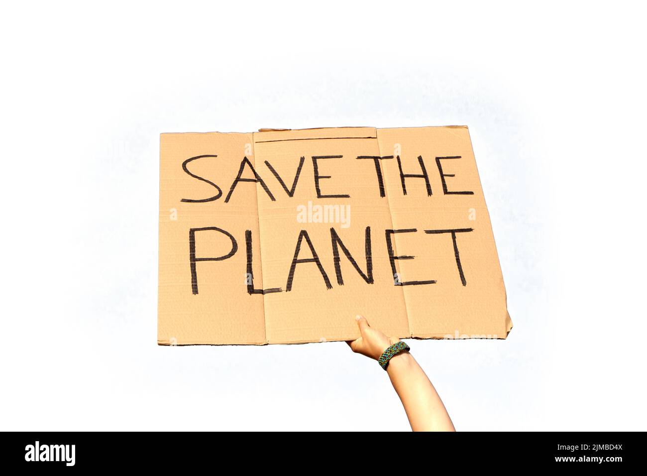 A Cardboard Signs saying Save the Planet held by two hands on a white ...
