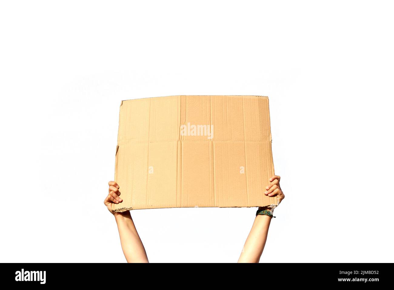 A cardboard Signs empty held by hands on a white background ready for ...