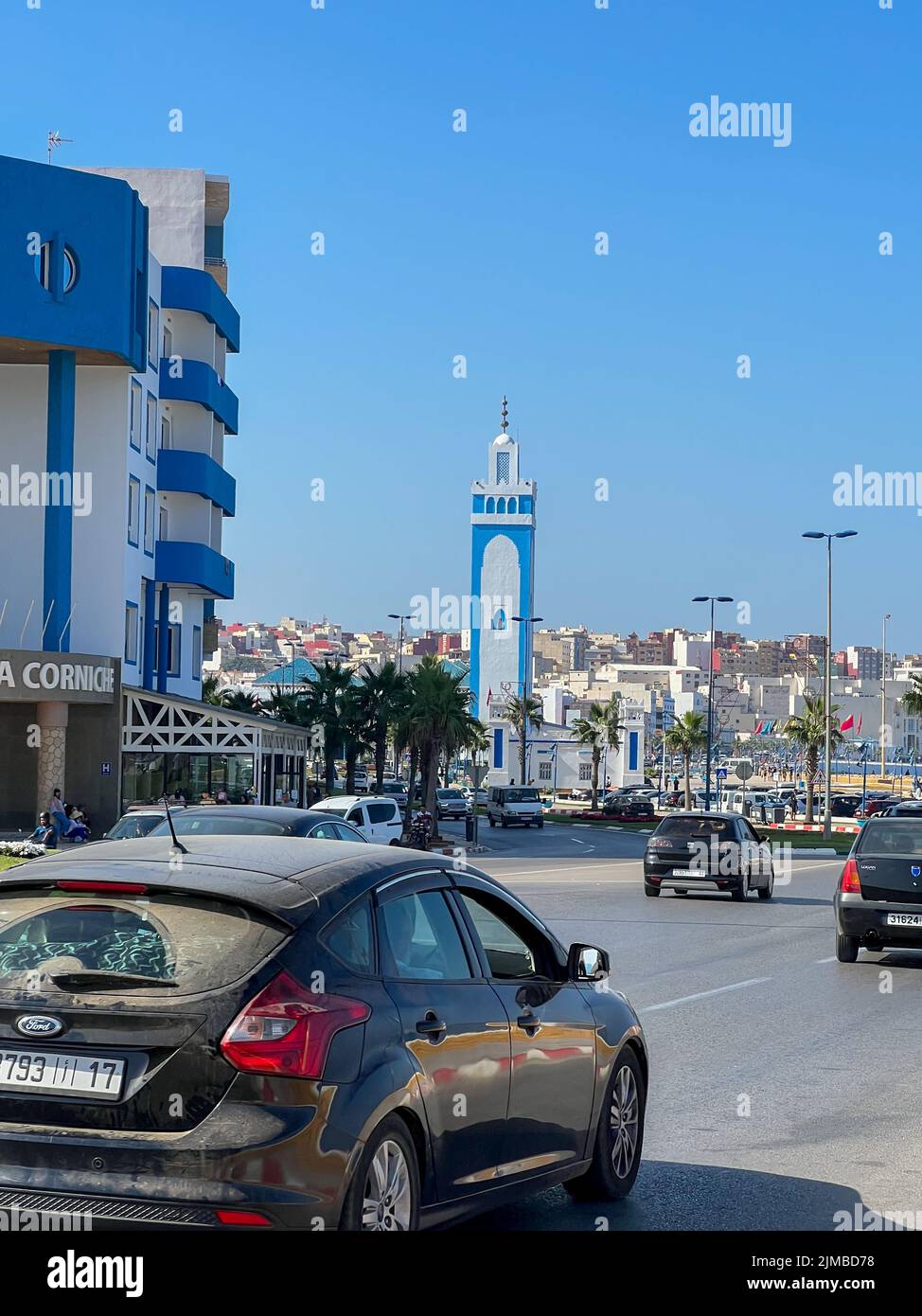 Cars drive toward the Mohamed VI mosque in Fnideq Stock Photo - Alamy