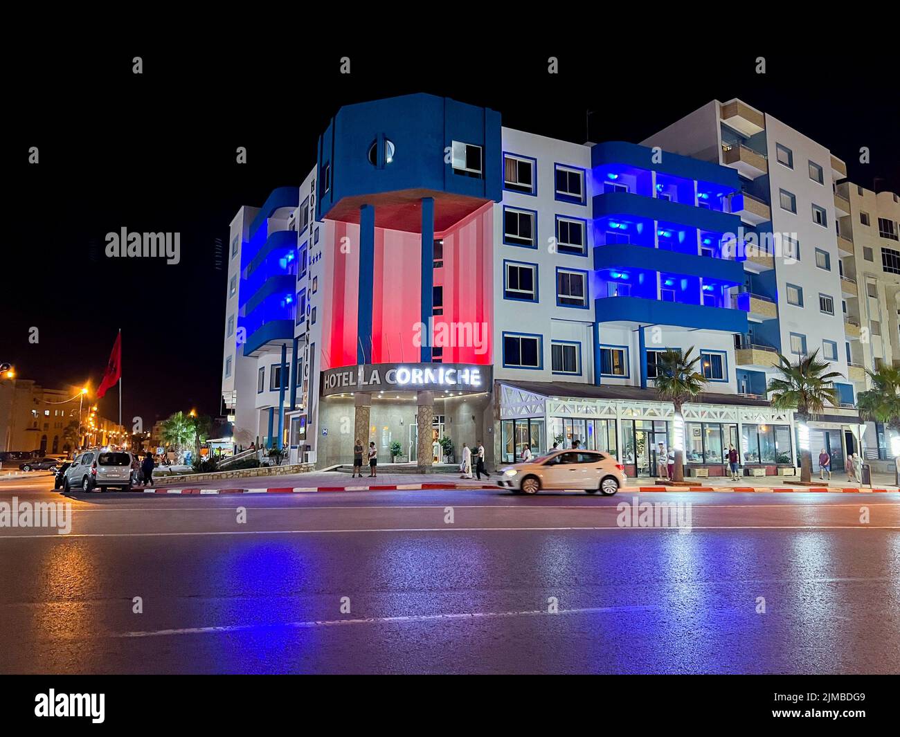 The exterior of hotel La Corniche in Fnideq at night Stock Photo - Alamy