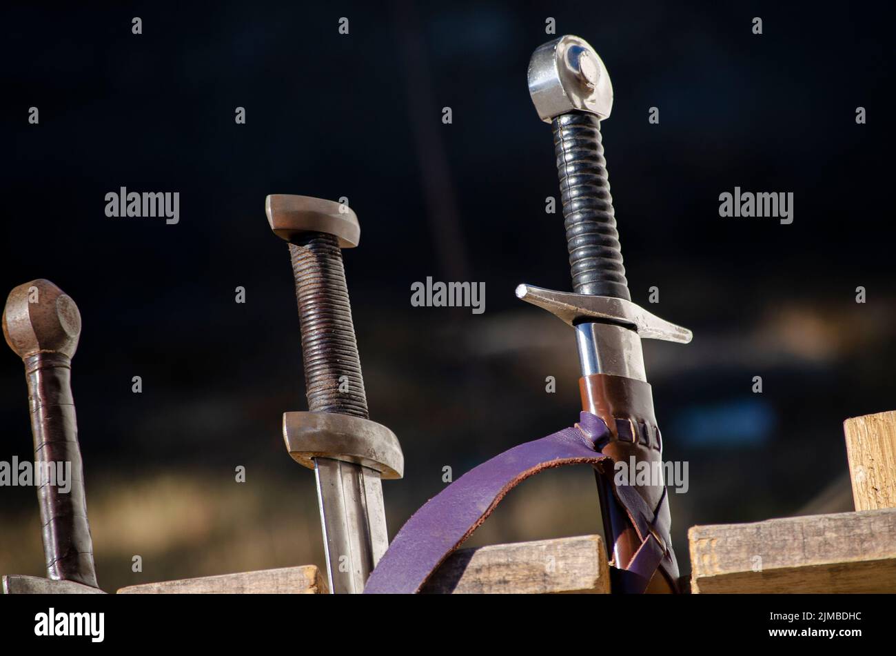 Replicas of medieval swords for historical reenactments Stock Photo - Alamy