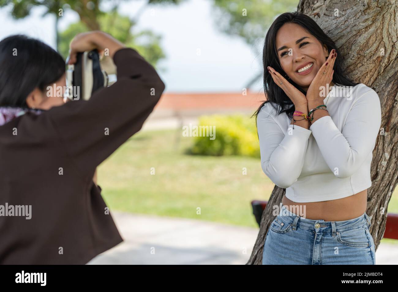 Woman posing with emotion for a friend photographer Stock Photo - Alamy
