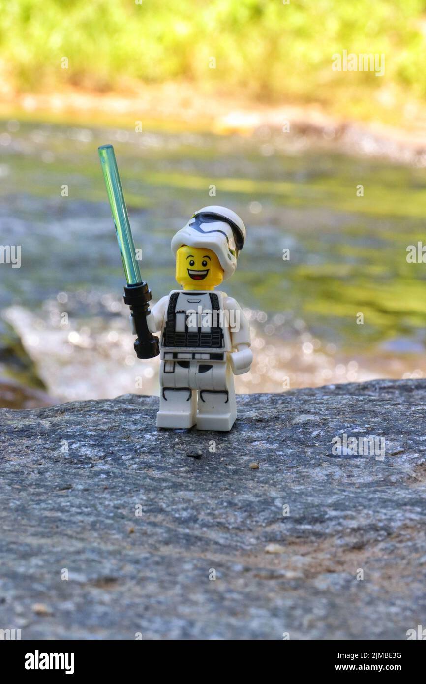 Trooper, plastic, smiling toy figur holding an accessory wearing a ...