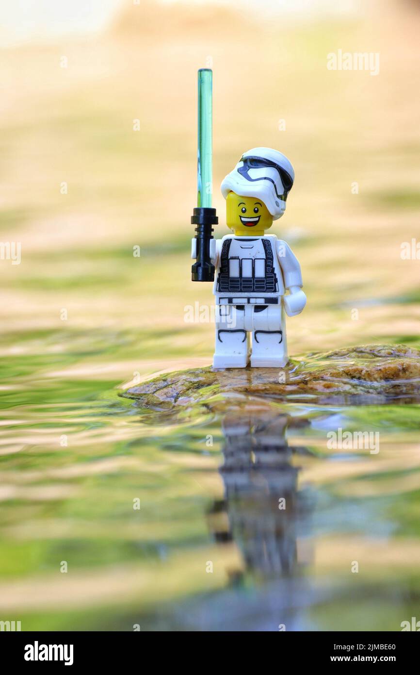 Trooper, plastic, smiling toy figur holding an accessory wearing a ...