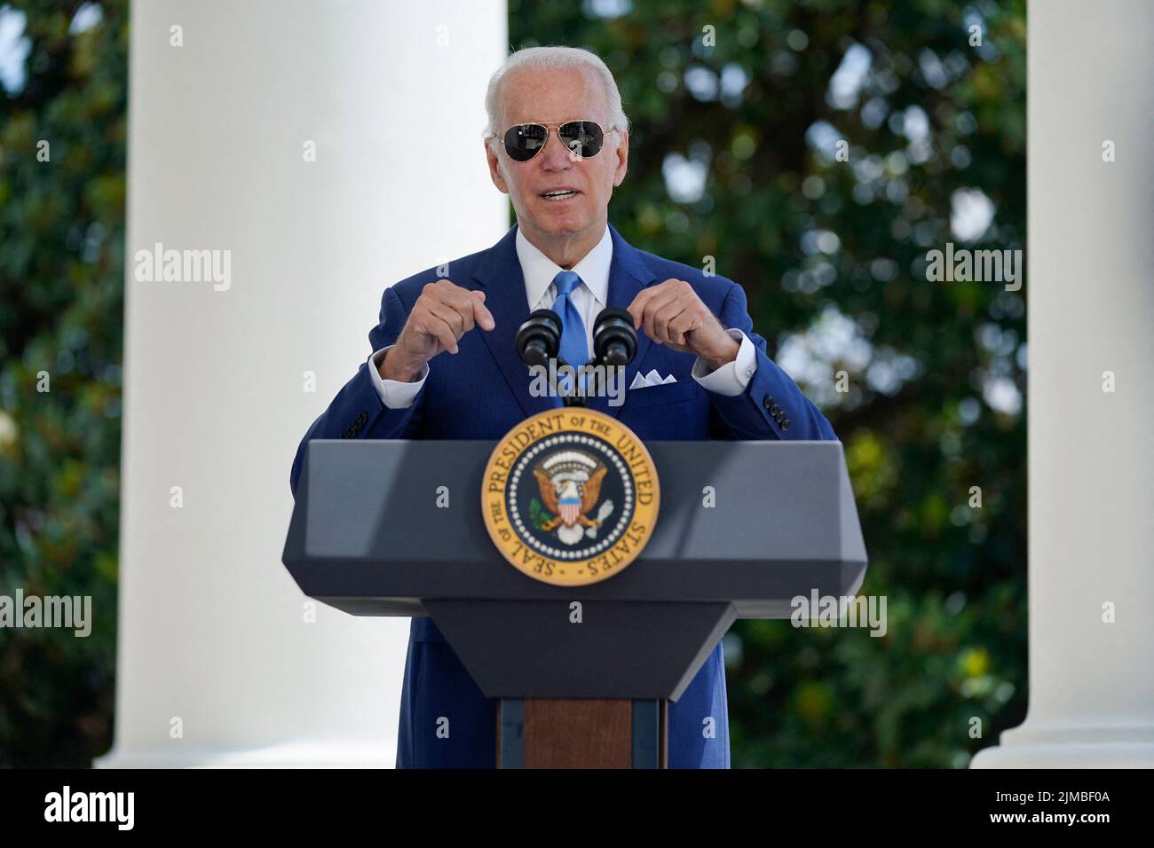 President Joe Biden speaks before signing two bills aimed at combating ...