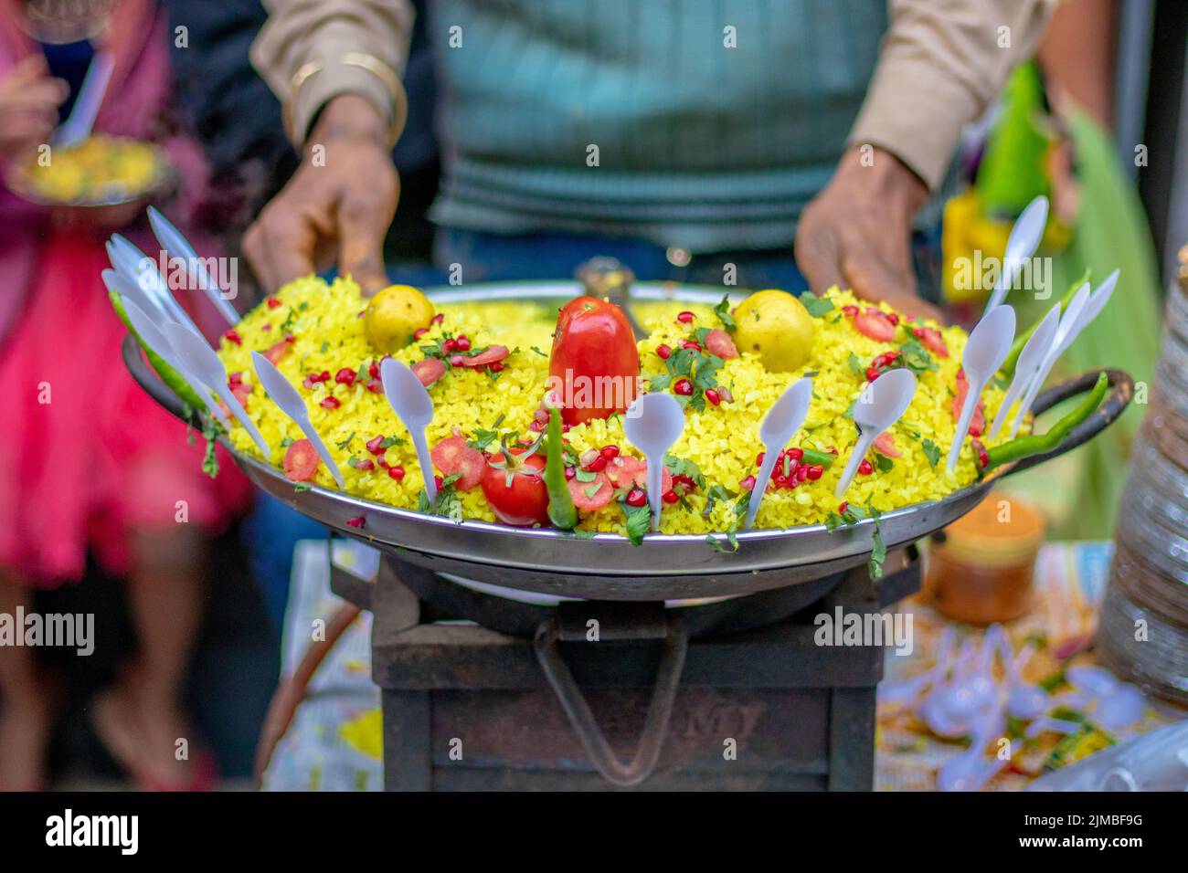 A close-up shot of poha, popular traditional Indian spicy snack Stock ...