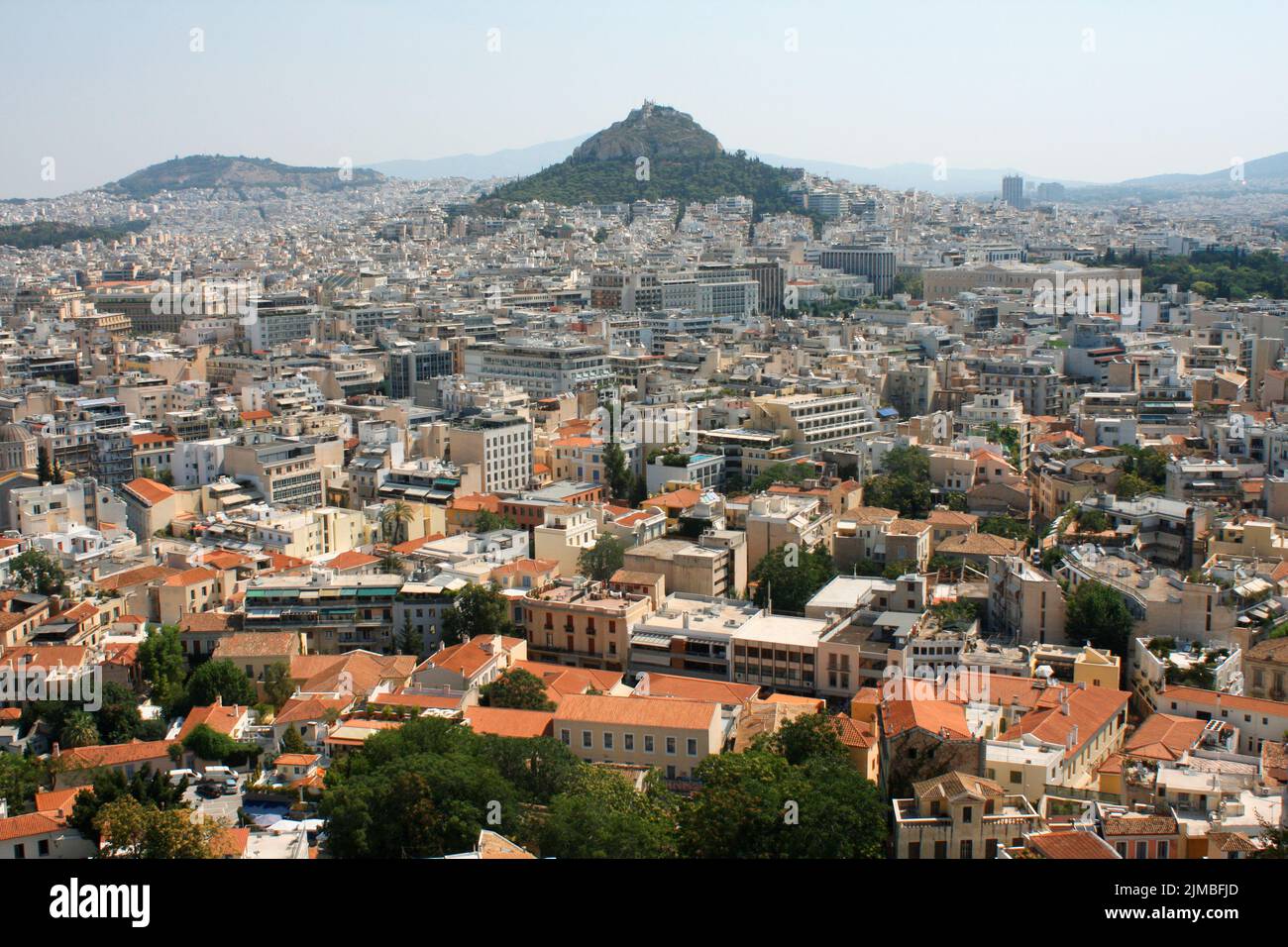 A scenic aerial view of the beautiful architecture of Athens, Greece on a sunny day Stock Photo ...
