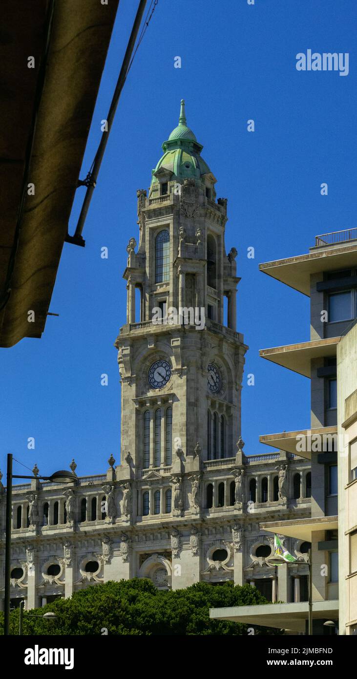 A vertical shot of the Porto city hall against blue sky background ...