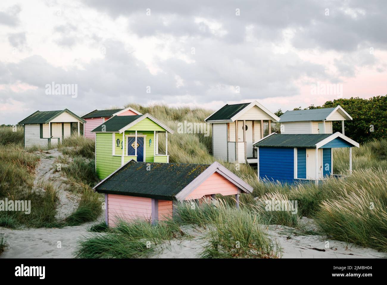 The colorful beach huts on Skanor beach in Falsterbo, Skane, Sweden ...