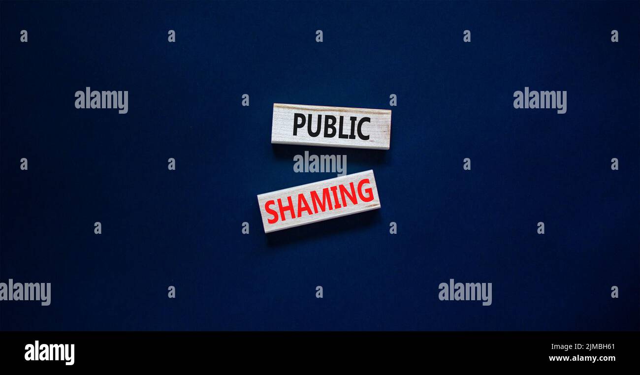 Public shaming symbol. Concept words Public shaming on wooden blocks on ...