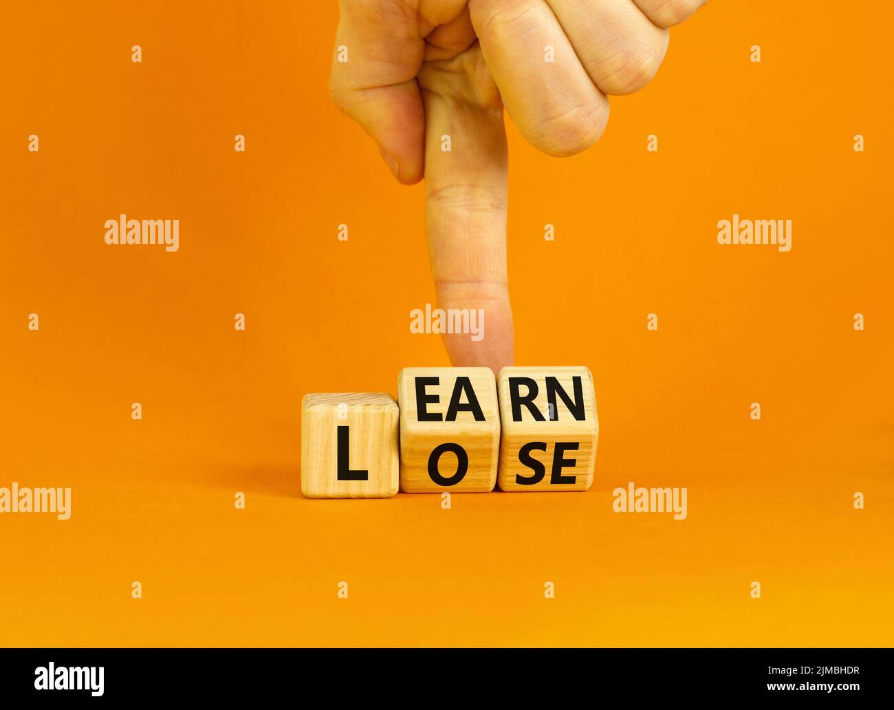 Learn or lose symbol. Concept words Learn and Lose on wooden cubes ...