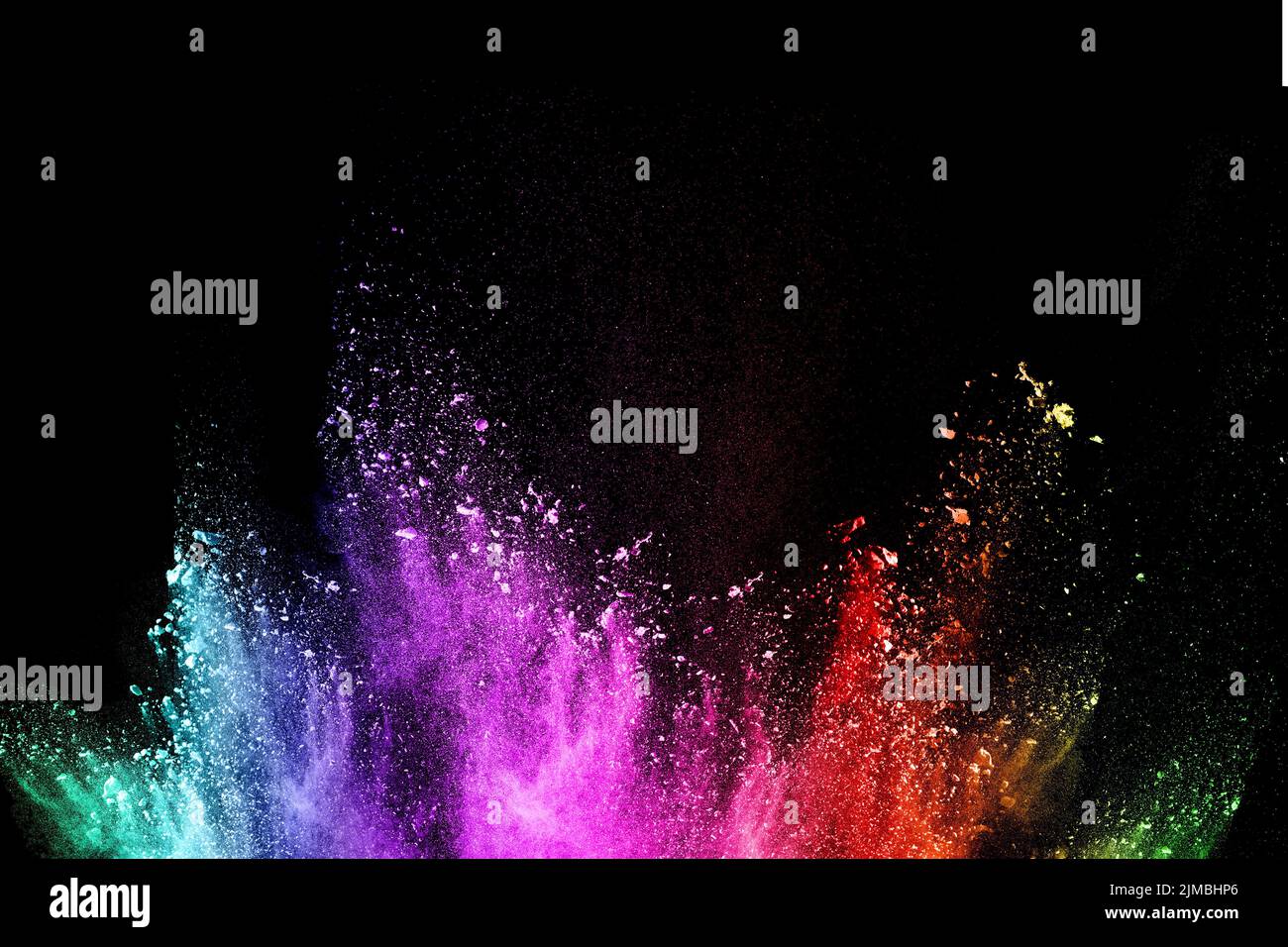 Abstract color powder explosion on black background.Freeze motion of ...