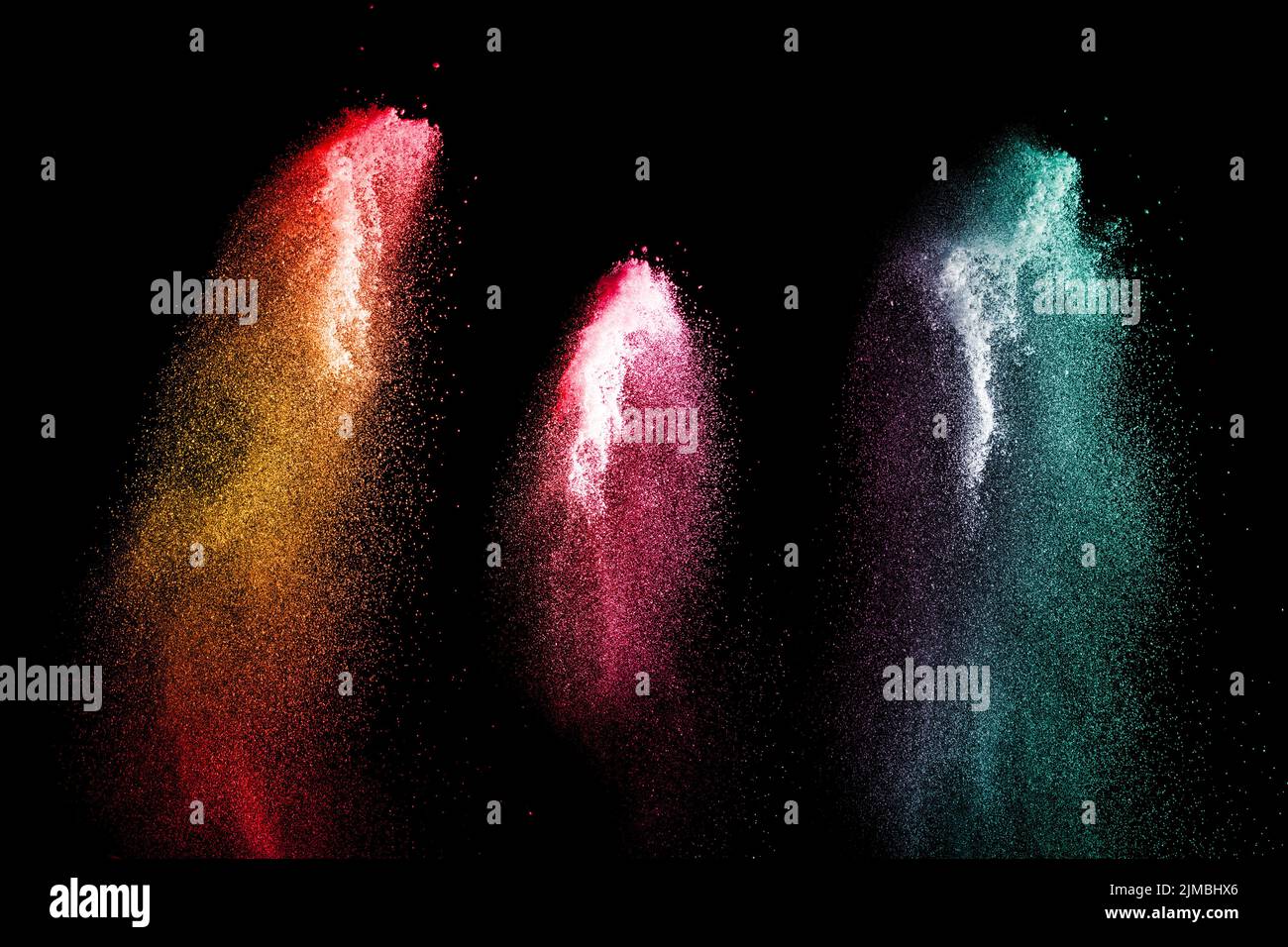 Abstract color powder explosion on black background.Freeze motion of ...