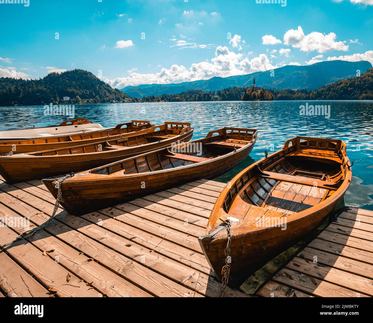 Traditional wooden boats Pletna on the backgorund of Church on the ...
