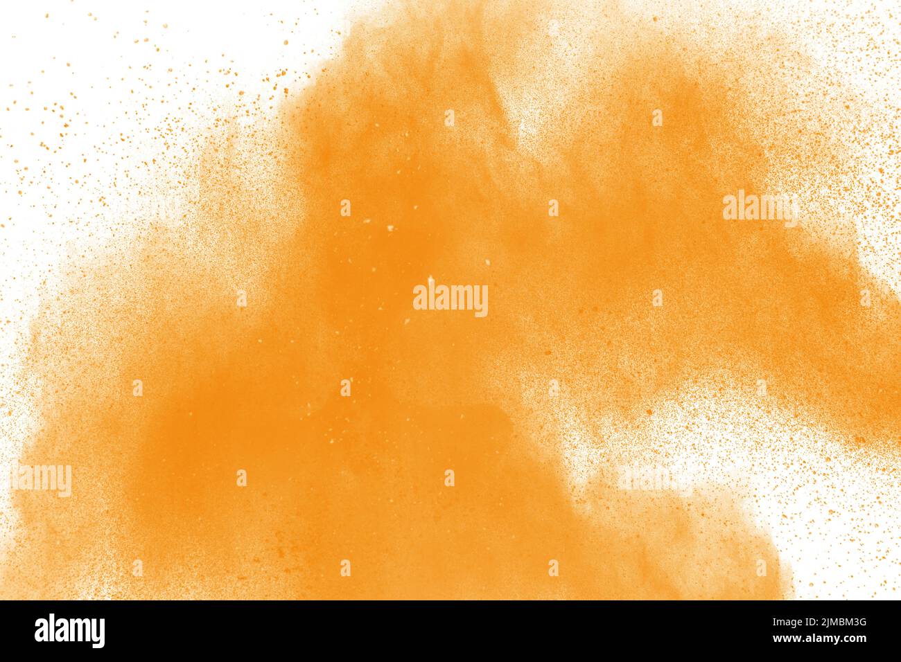 Abstract explosion of orange dust on white background. Freeze motion of ...