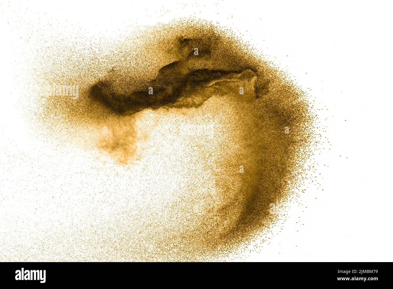 Golden sand explosion isolated on white background.Brown dust particles ...