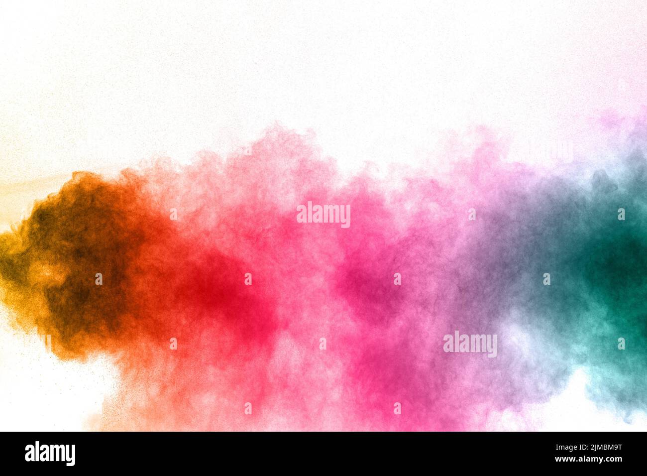 Multi color powder explosion on white background.Red yellow and green ...