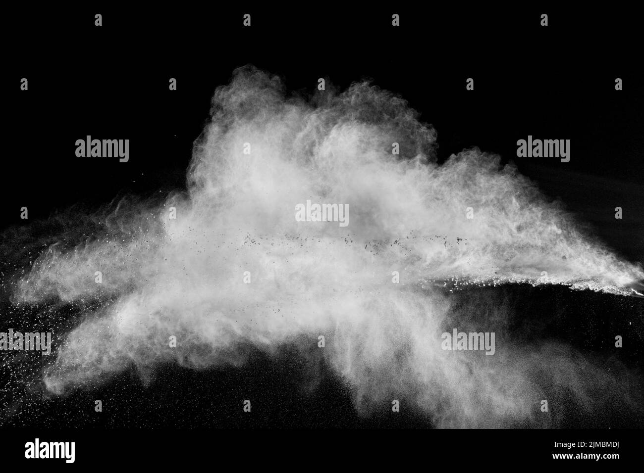 Abstract white powder explosion against black background.Abstract white ...