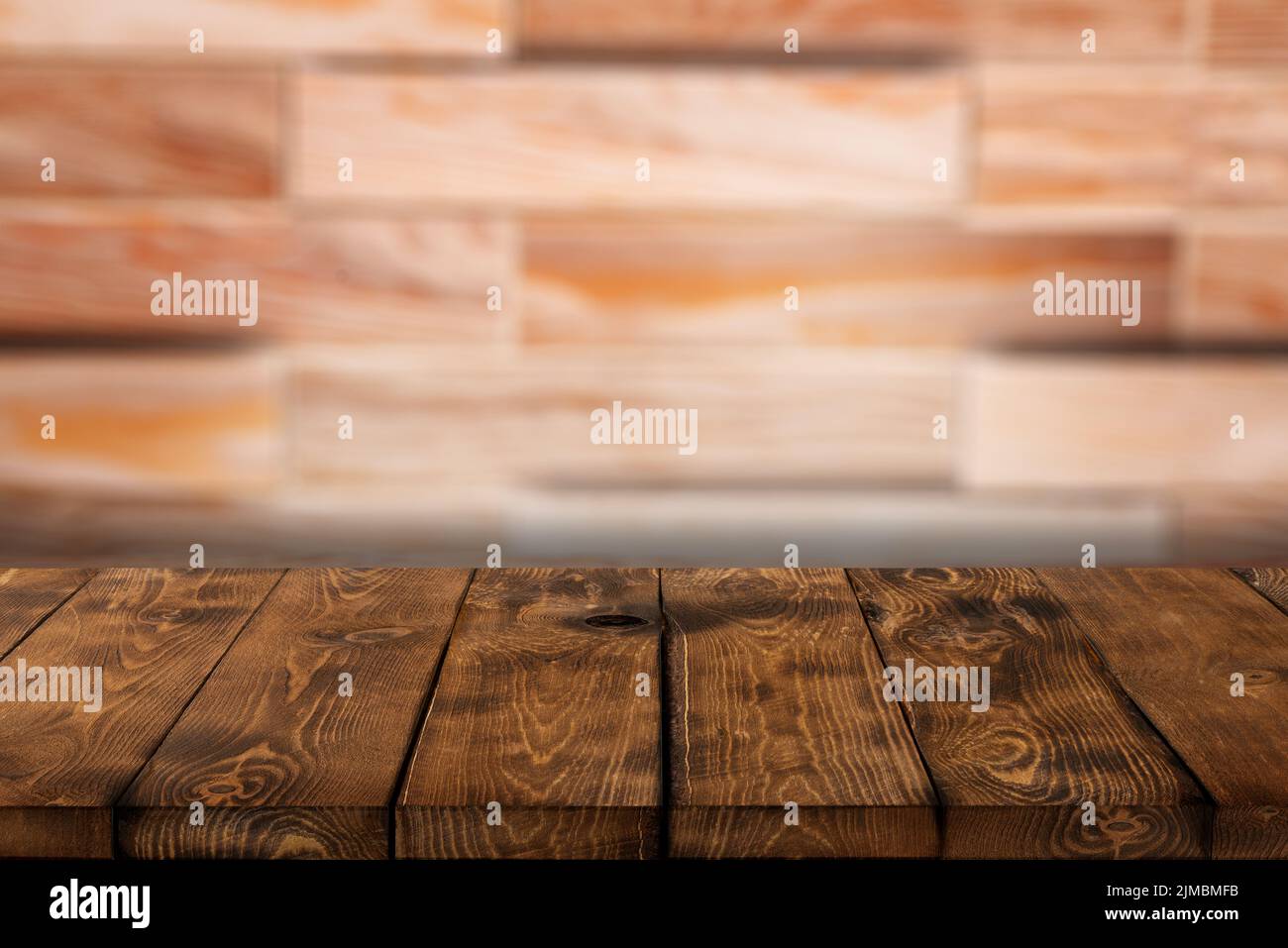 Wooden board, empty table in front of a blurred background. Perspective ...