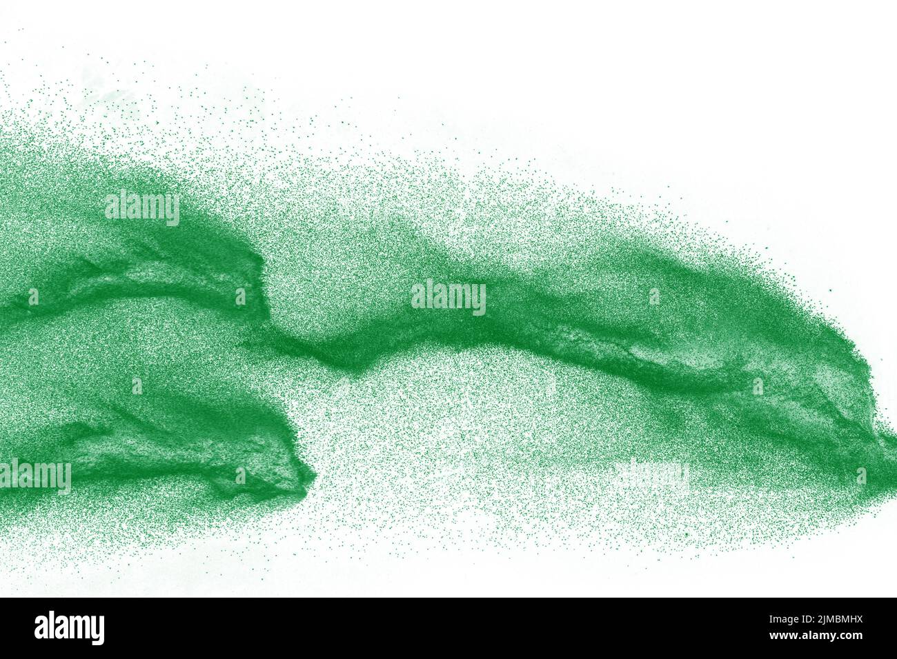 Green color powder explosion cloud on white background.Green dust ...