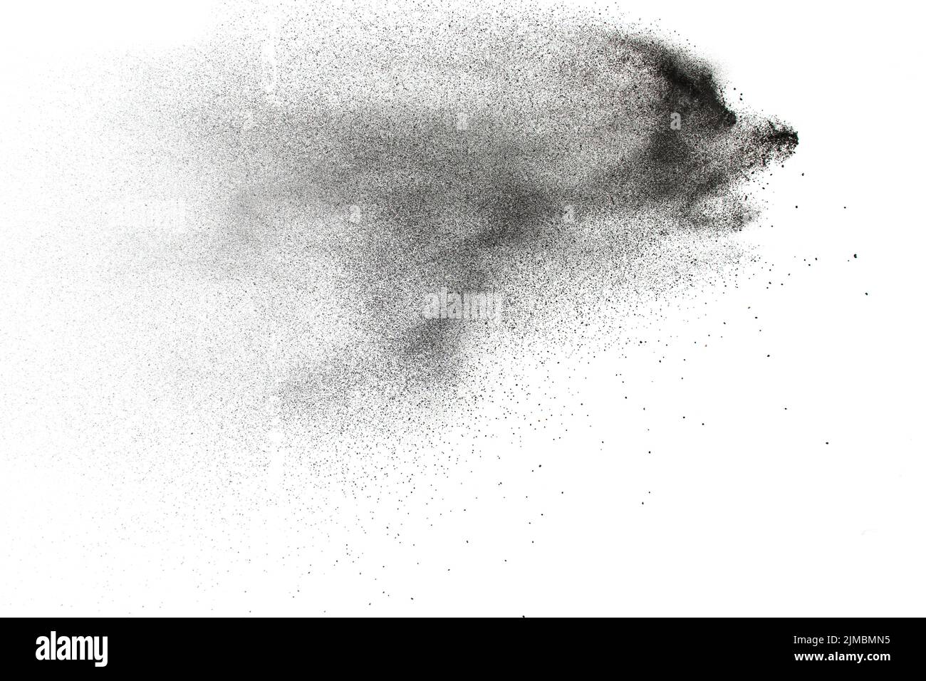Black powder explosion on white background.Black dust particles splash ...