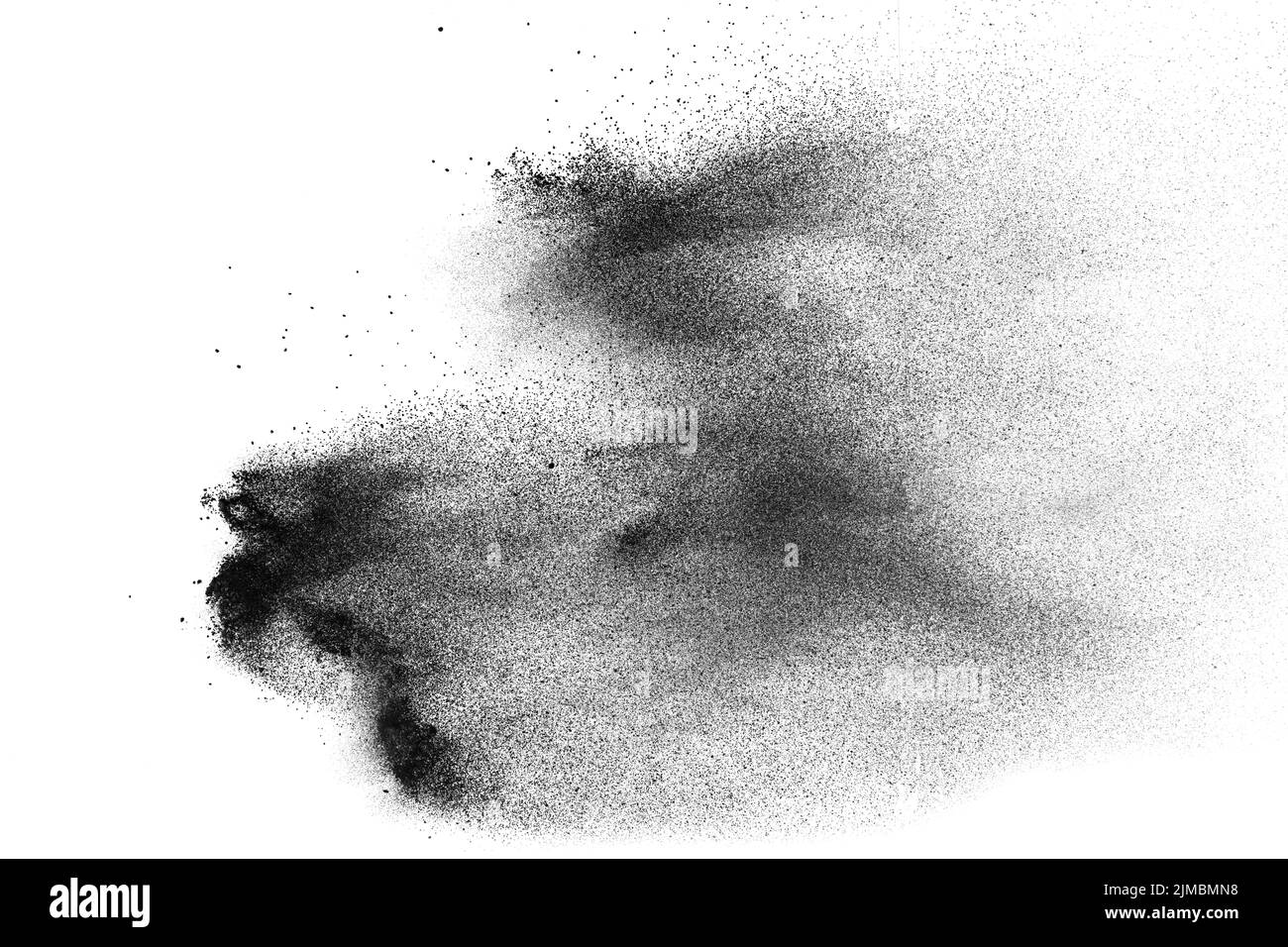 Black powder explosion on white background.Black dust particles splash ...