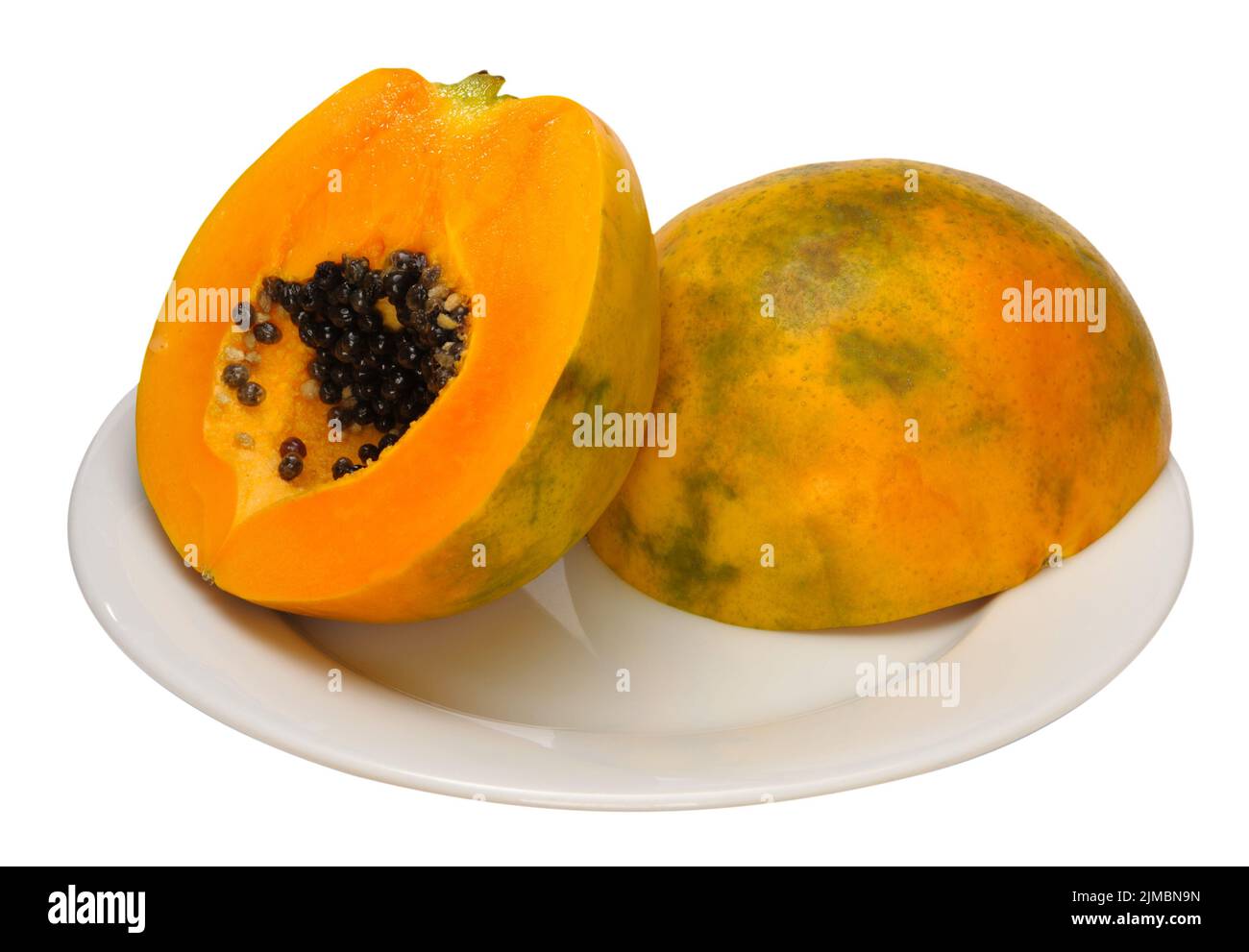 One yellow juicy cut papaya (Carica papaya) fruit isolated on white ...