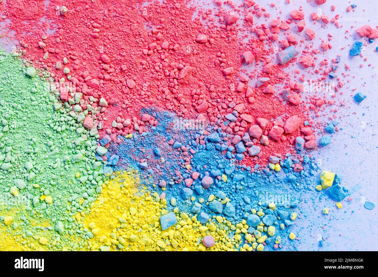 Colorful background of chalk powder. Multicolored dust particles ...