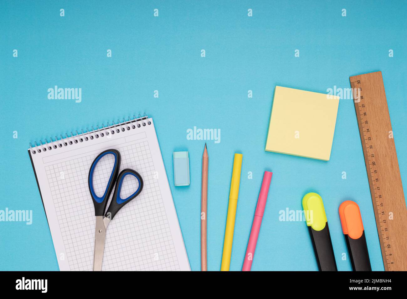 Notebook, scissors, colored pencils, eraser, note paper and ruler. back ...