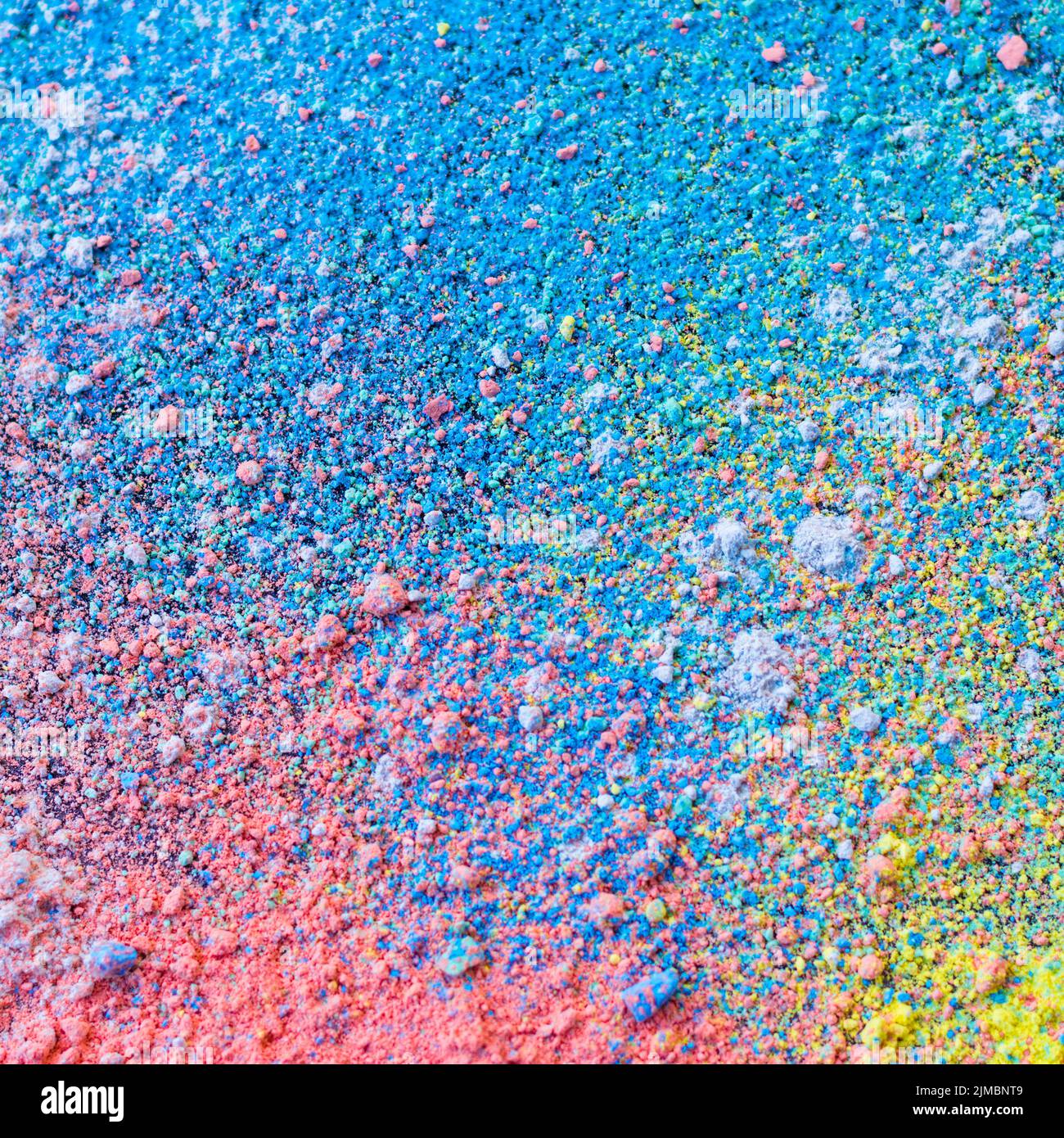 Colorful background of chalk powder. Multicolored dust particles ...