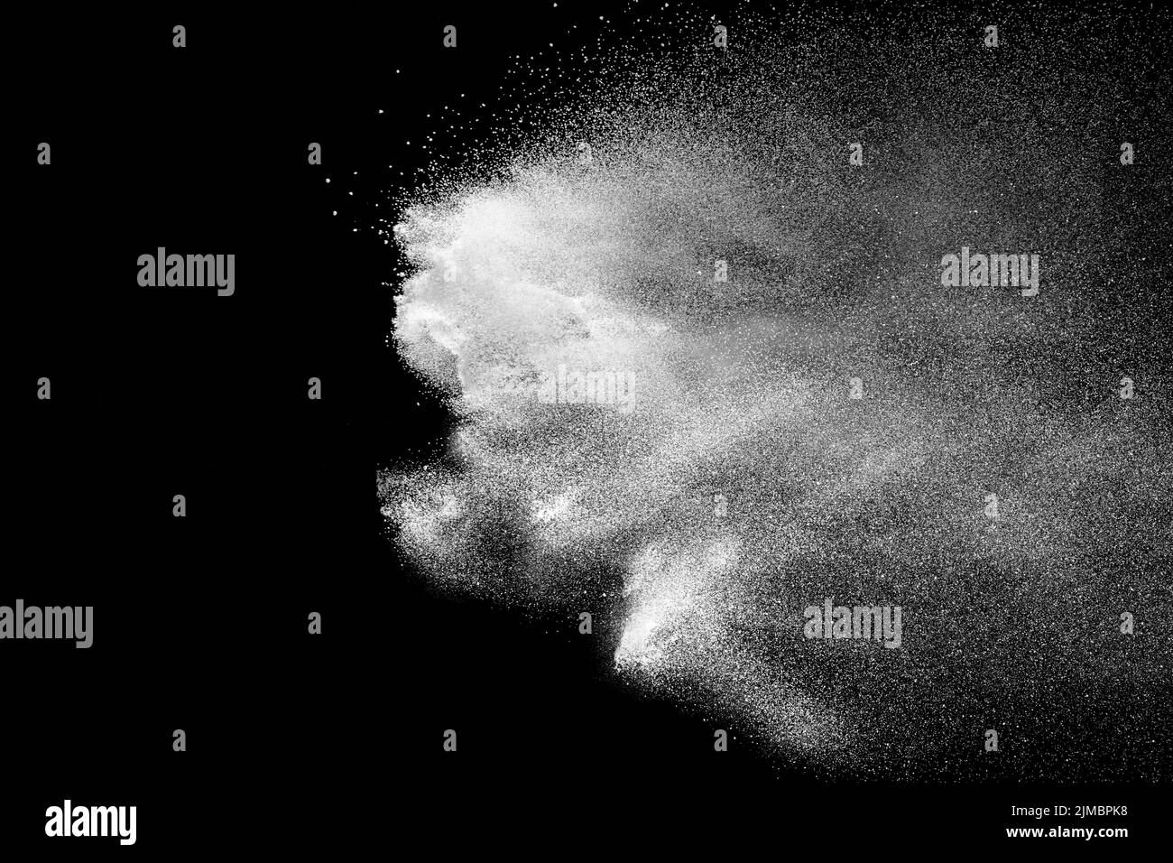 White talcum powder explosion on black background. White dust splashing ...